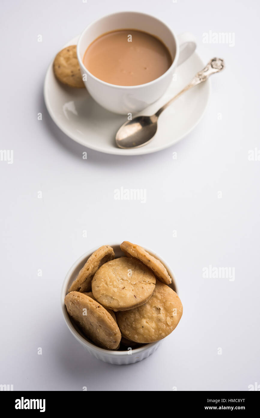 spicy fried mathri or mathari which is an indian snack served with a ...