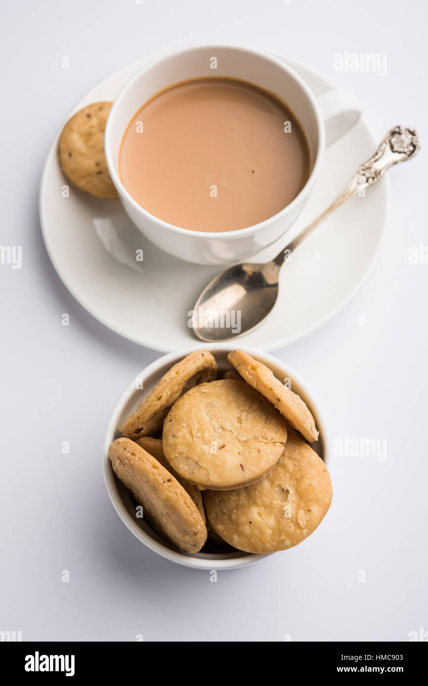 spicy fried mathri or mathari which is an indian snack served with a ...