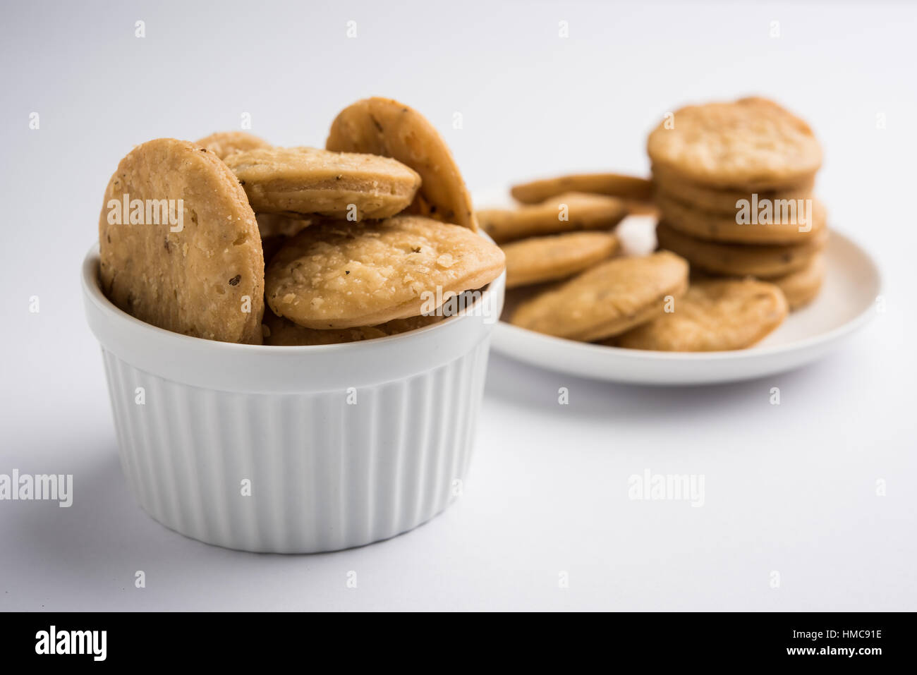 spicy fried mathri or mathari which is an indian snack served with a ...