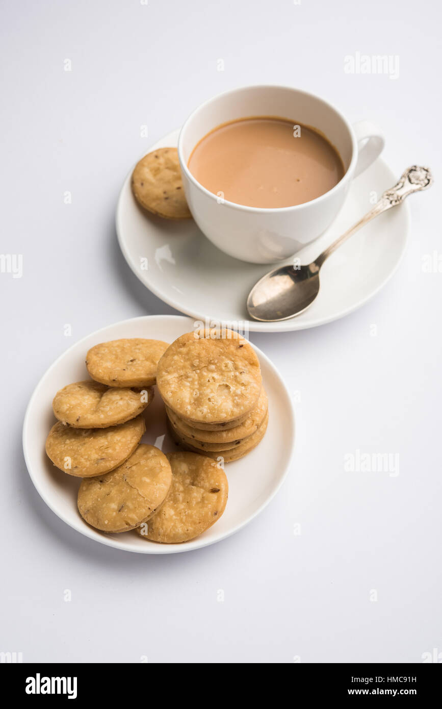 spicy fried mathri or mathari which is an indian snack served with a ...