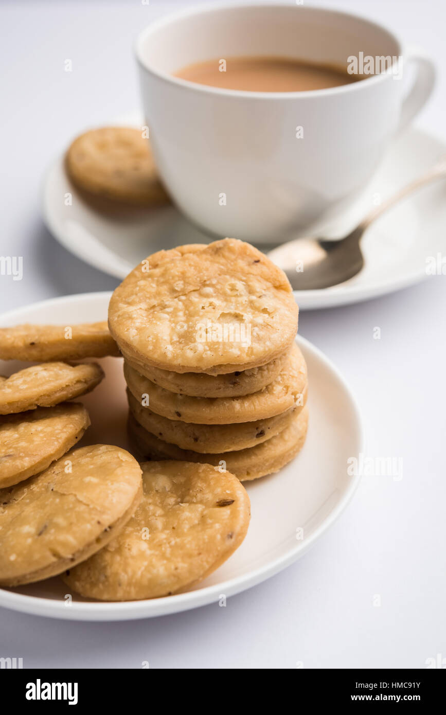 spicy fried mathri or mathari which is an indian snack served with a ...