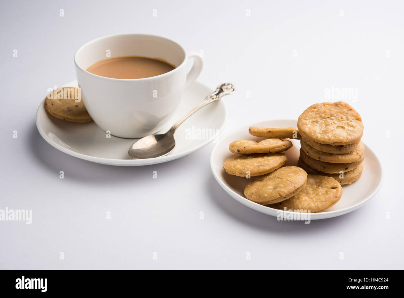 spicy fried mathri or mathari which is an indian snack served with a ...