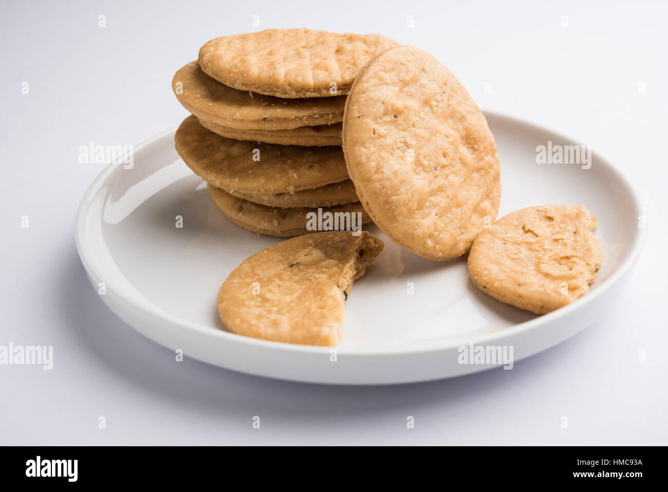 spicy fried mathri or mathari which is an indian snack served with a ...