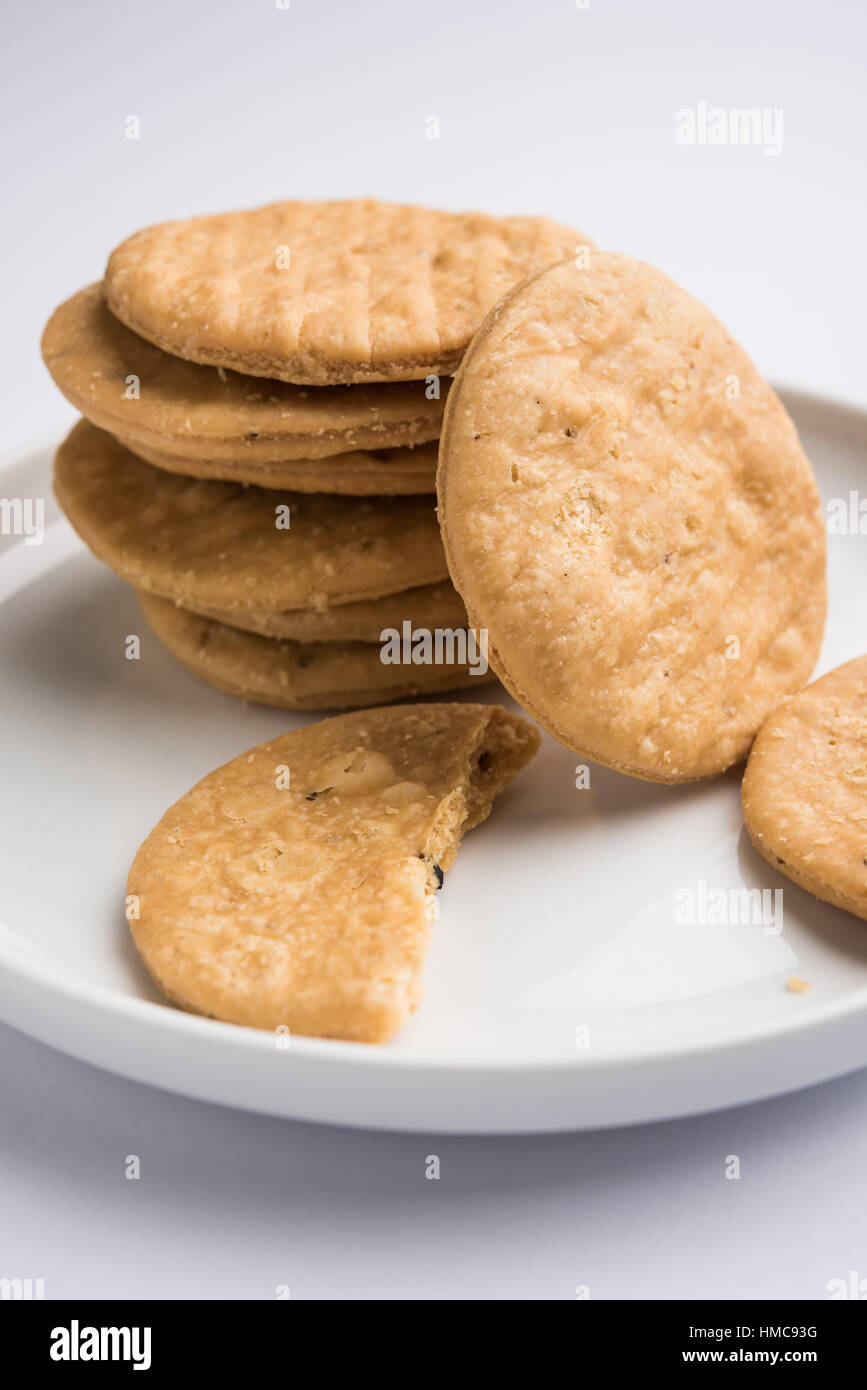 spicy fried mathri or mathari which is an indian snack served with a ...