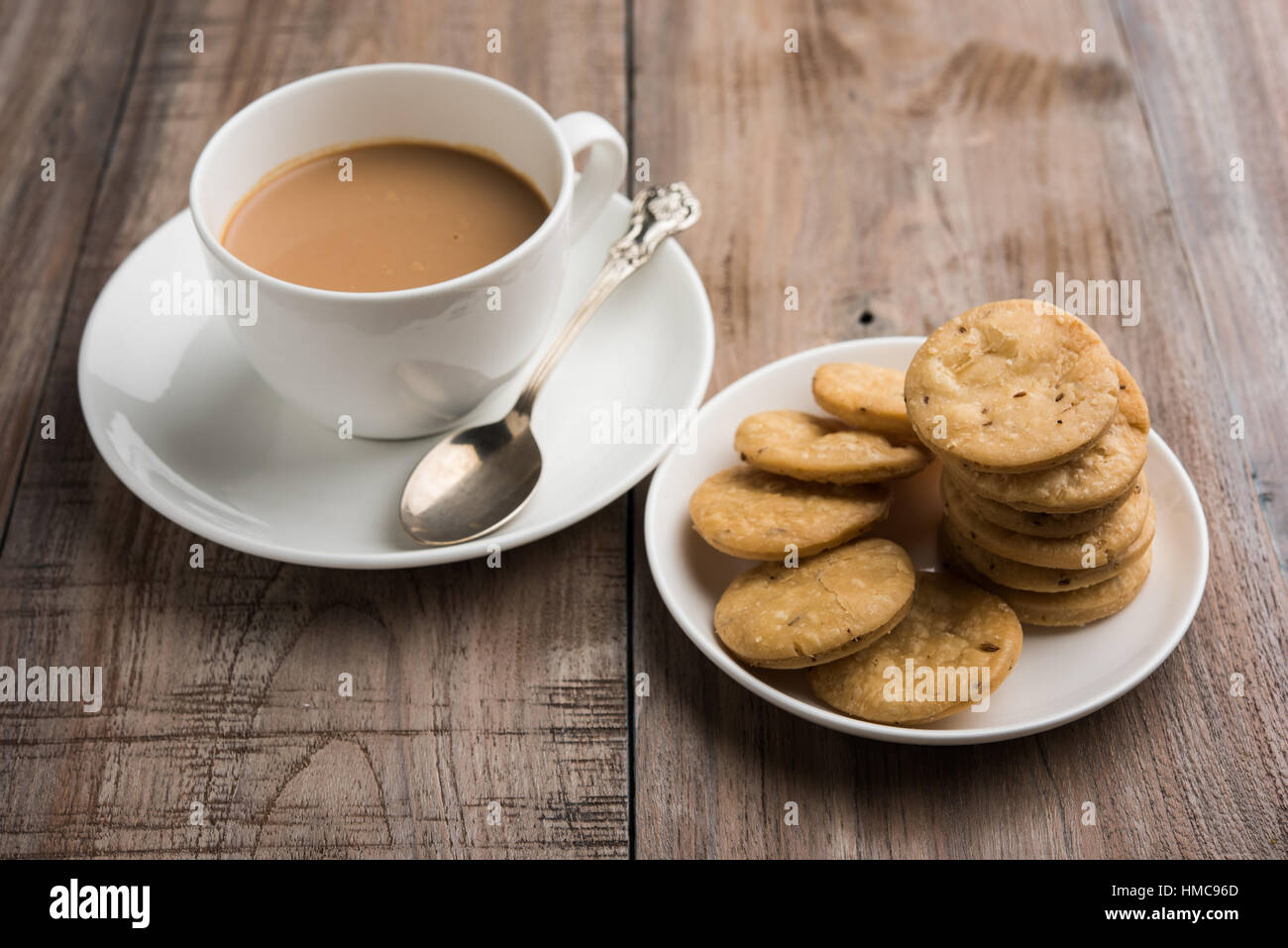 spicy fried mathri or mathari which is an indian snack served with a ...