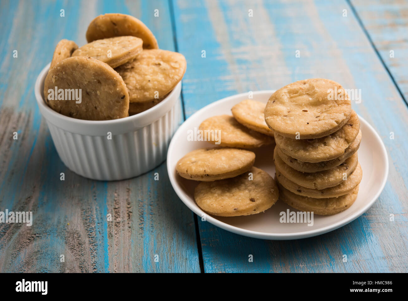spicy fried mathri or mathari which is an indian snack served with a ...
