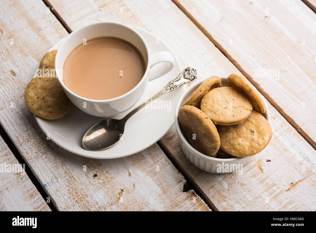 spicy fried mathri or mathari which is an indian snack served with a ...
