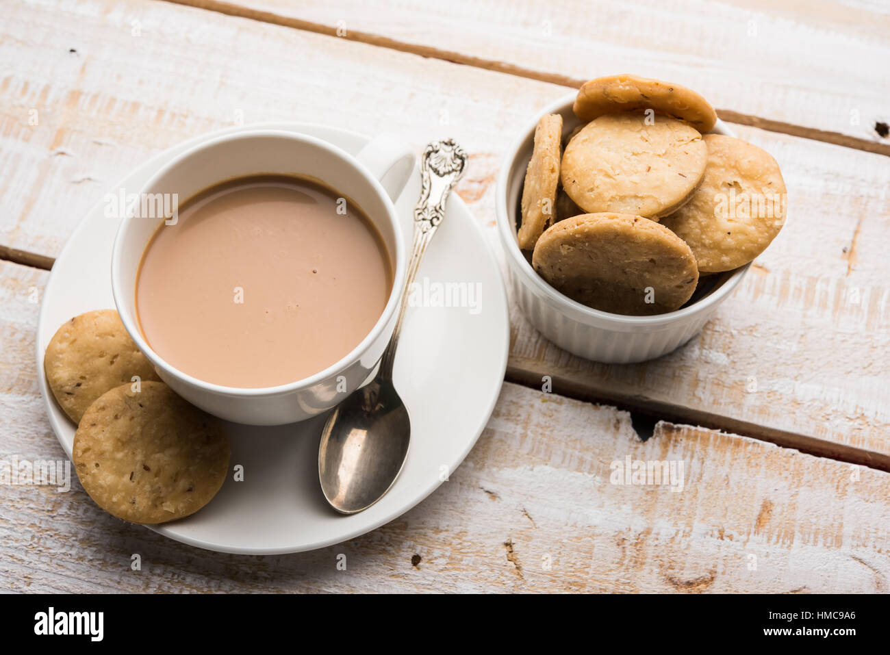 spicy fried mathri or mathari which is an indian snack served with a ...