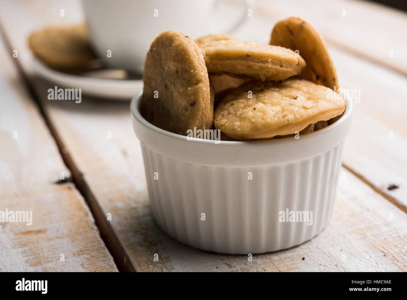 spicy fried mathri or mathari which is an indian snack served with a ...