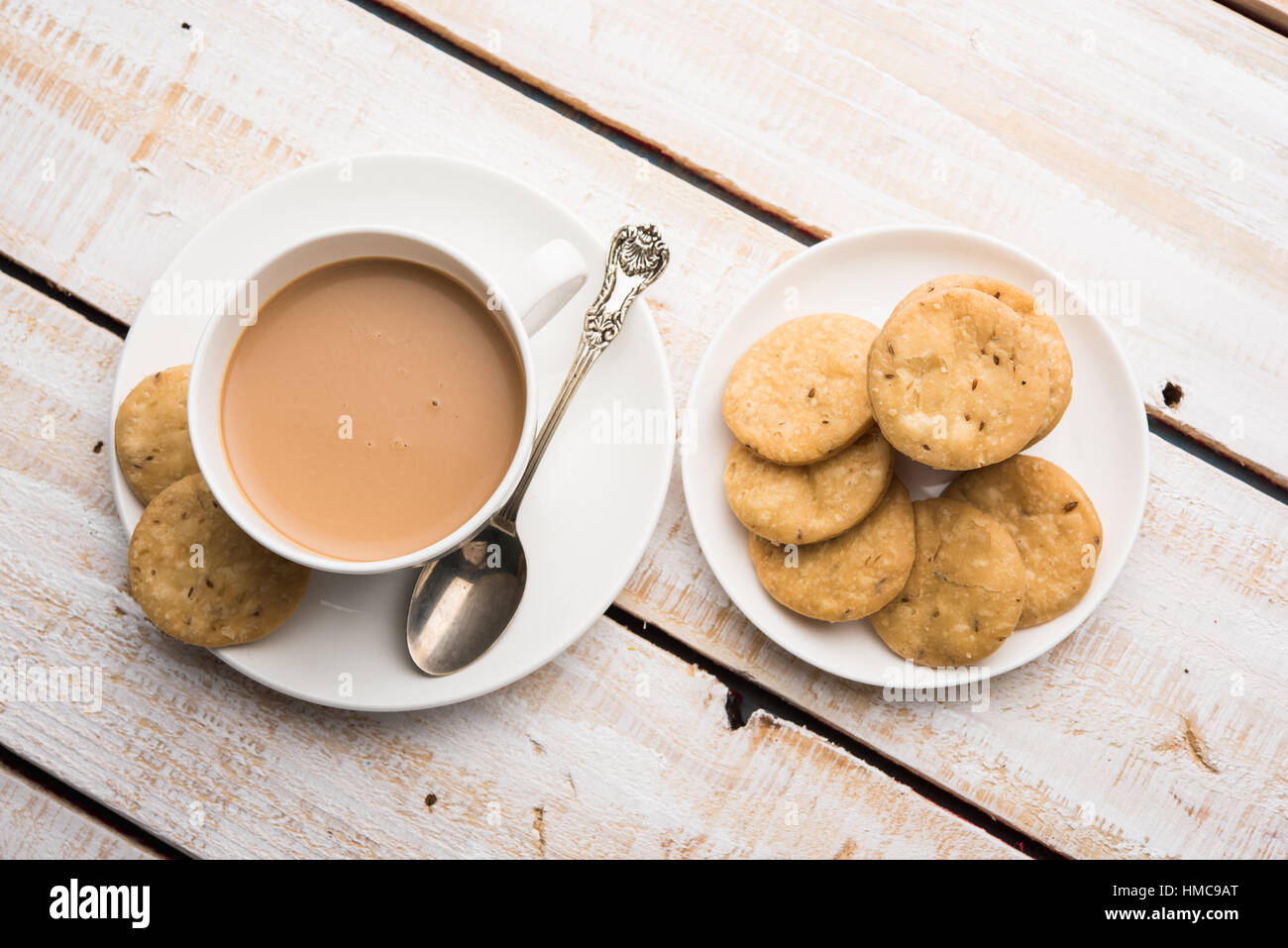 spicy fried mathri or mathari which is an indian snack served with a ...