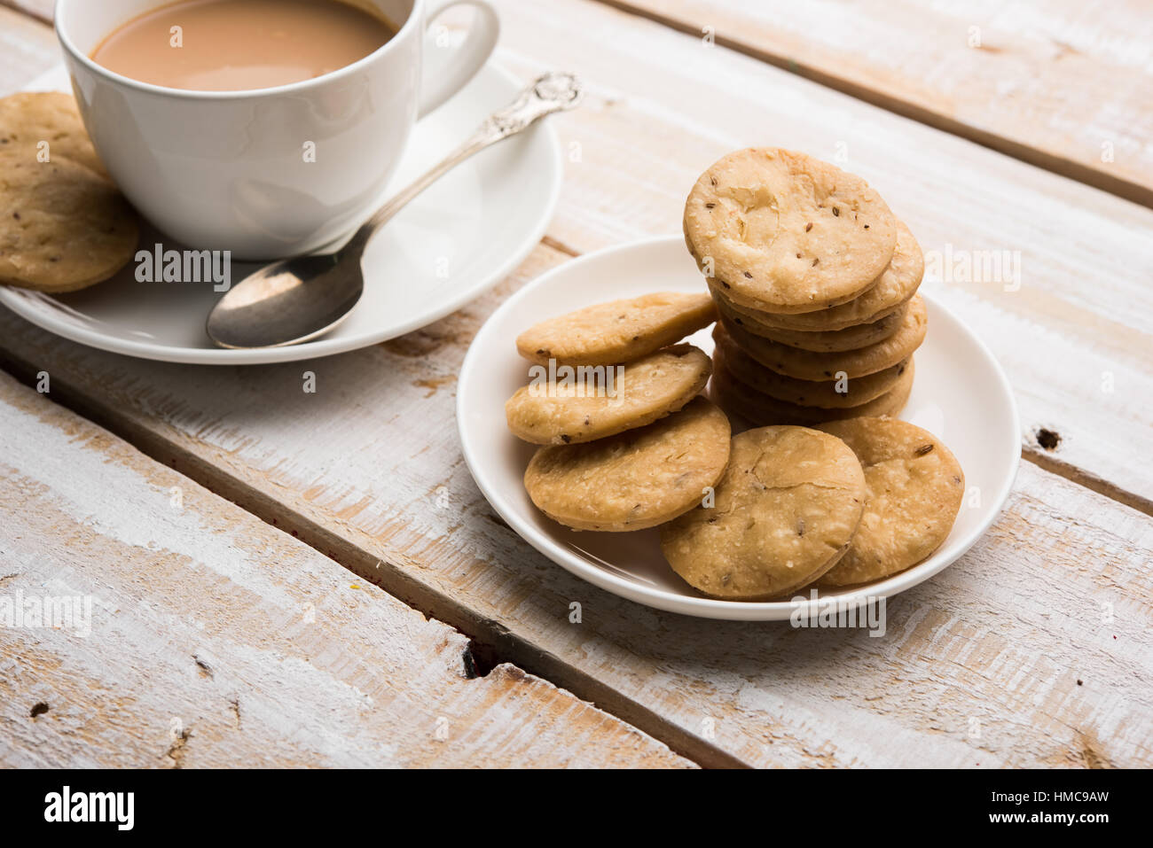spicy fried mathri or mathari which is an indian snack served with a ...