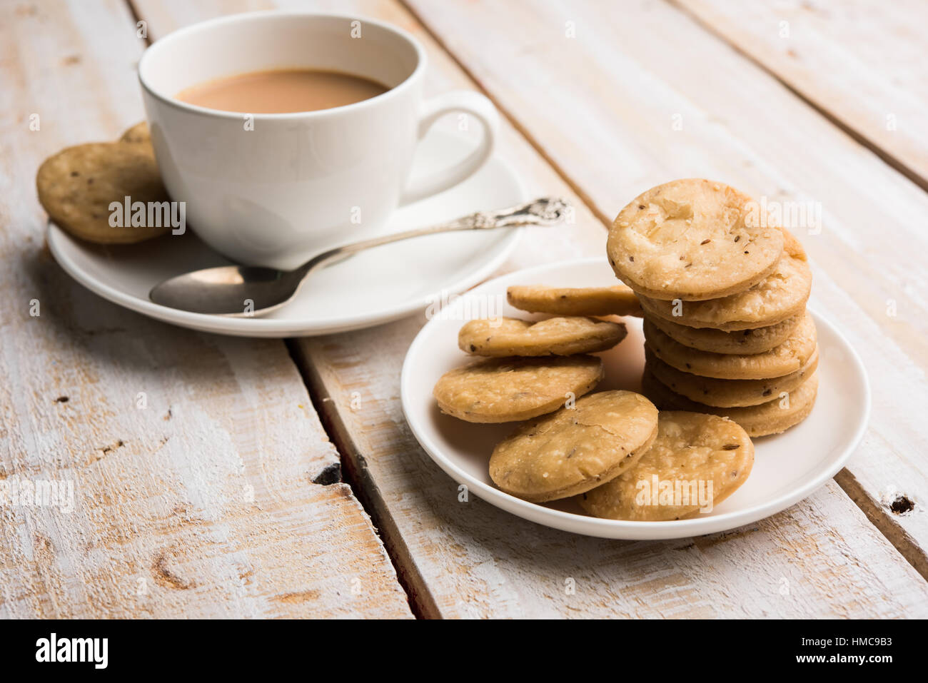 spicy fried mathri or mathari which is an indian snack served with a ...