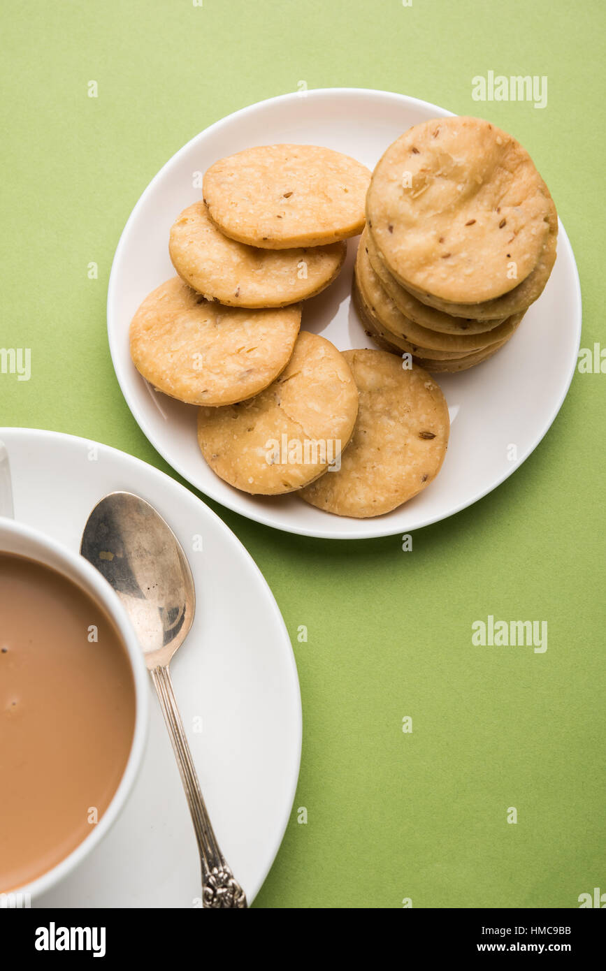 spicy fried mathri or mathari which is an indian snack served with a ...