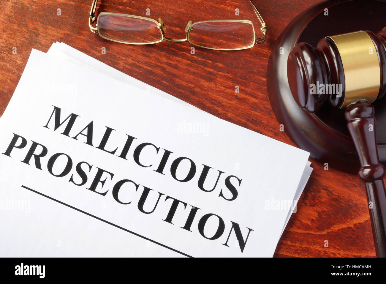 Malicious prosecution, documents and gavel on a table Stock Photo - Alamy