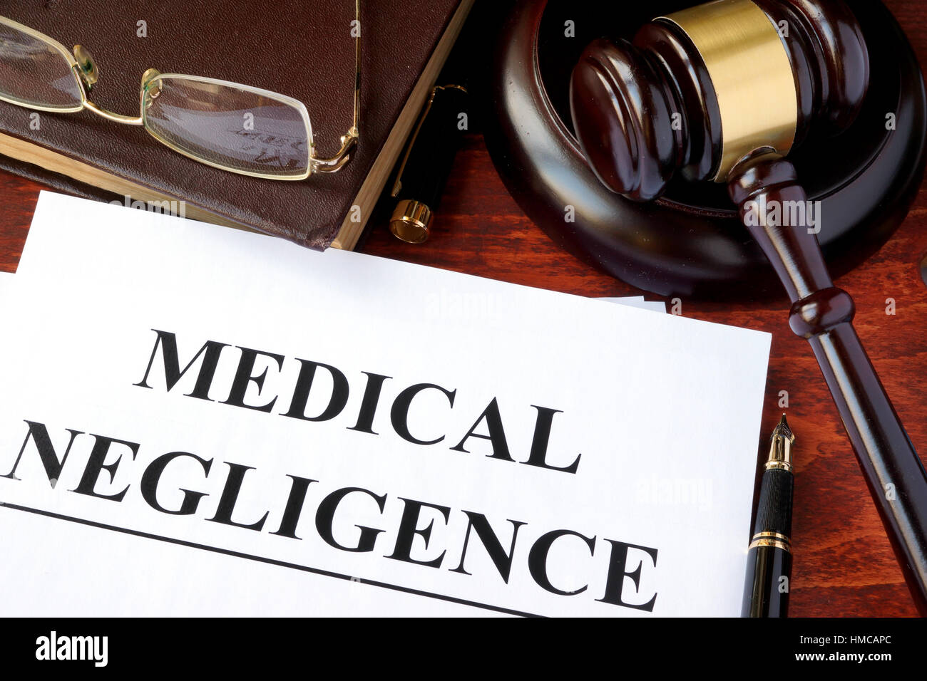 Medical Negligence form, documents and gavel on a table Stock Photo - Alamy