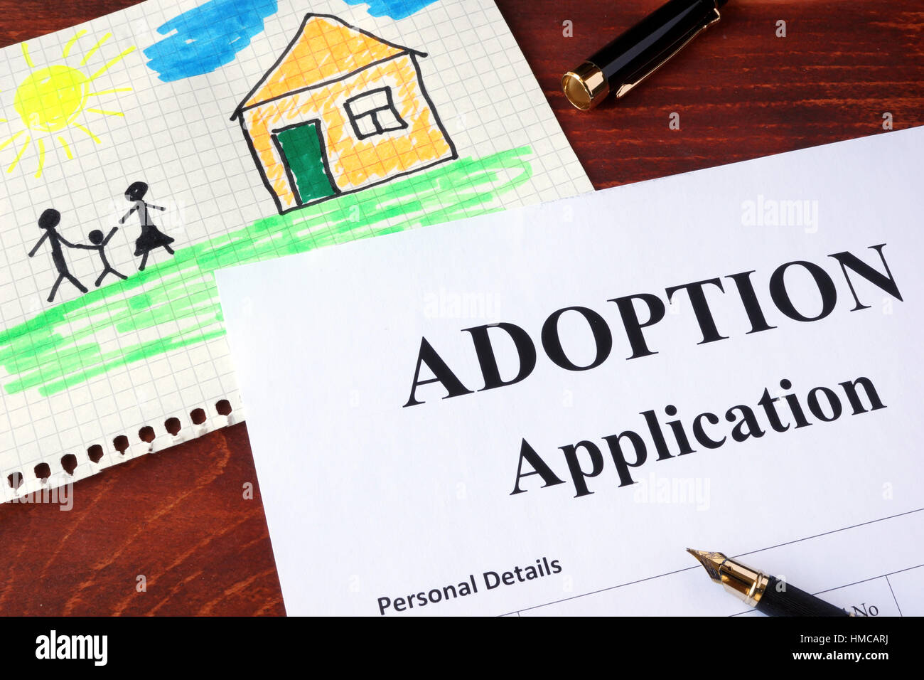 Adoption form and children’s picture Stock Photo - Alamy