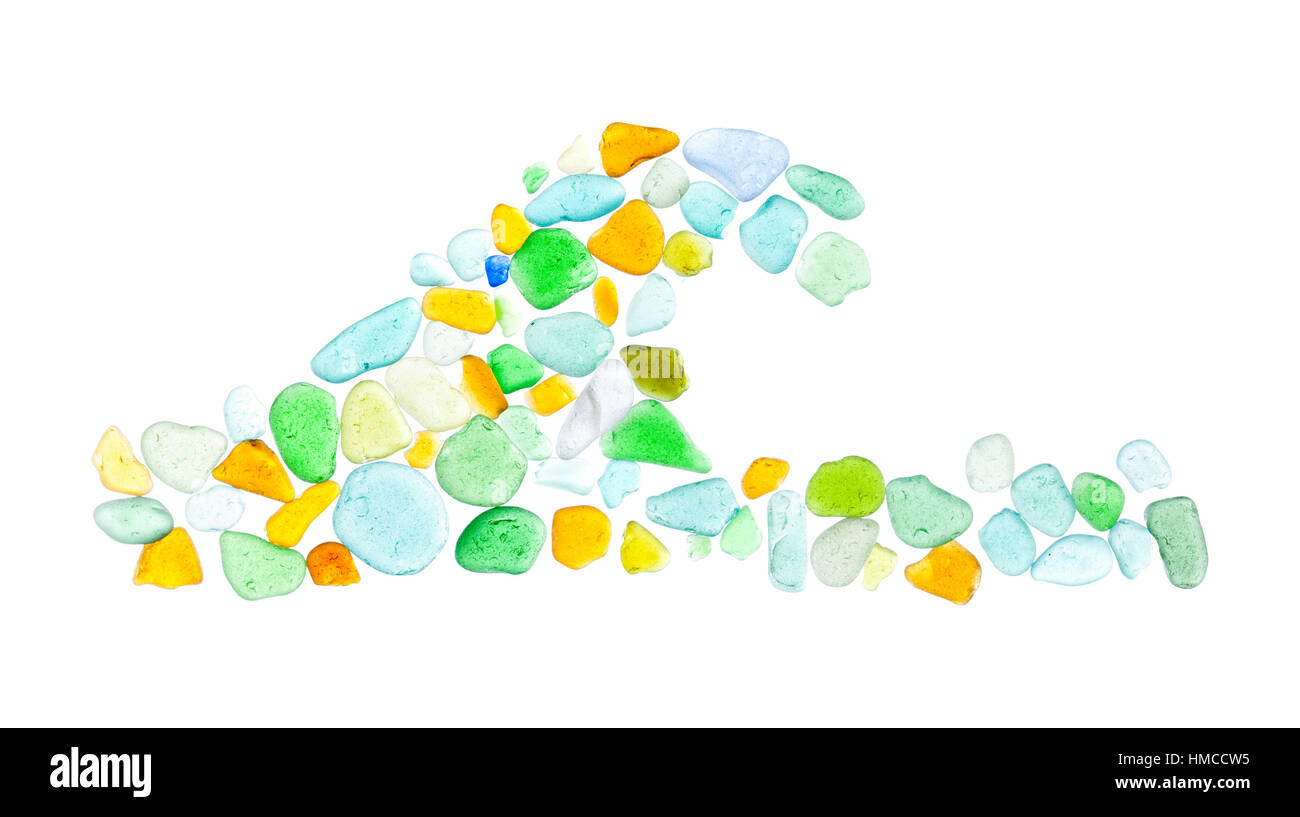 backlit sea glass peices isolated on white background, shape of a wave ...