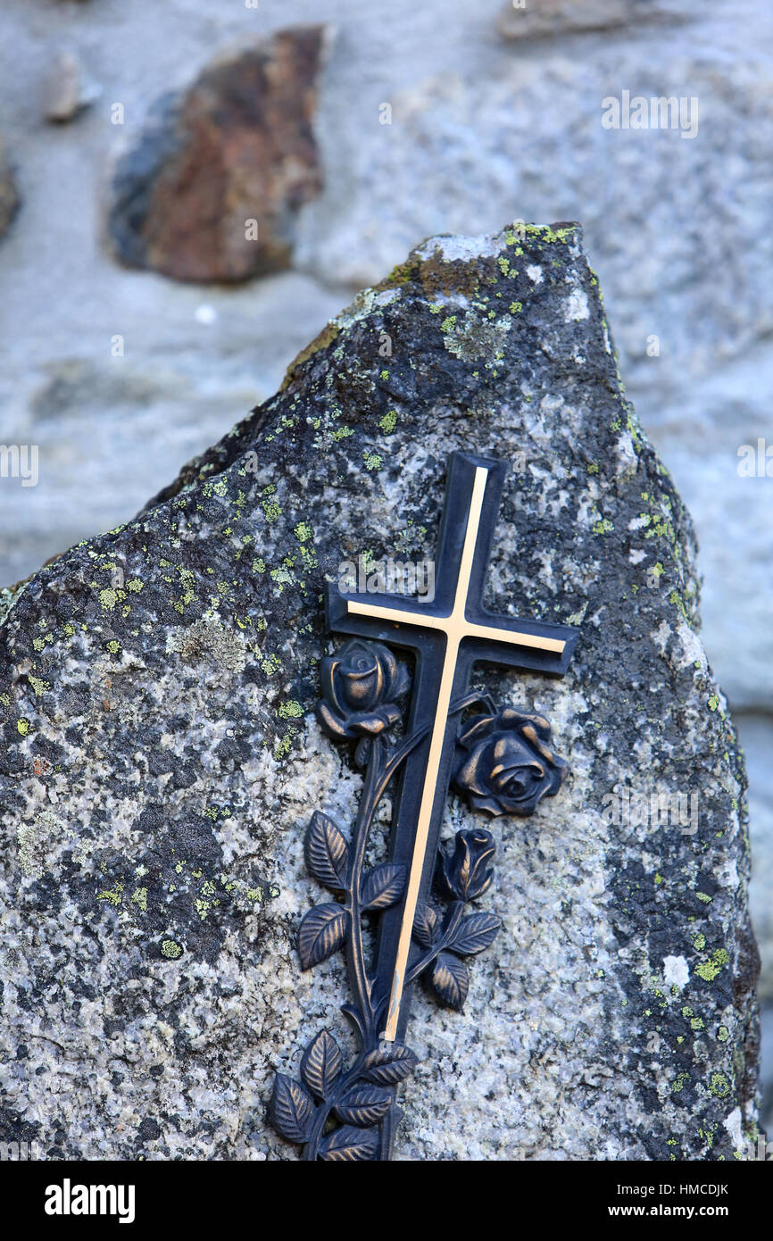 Forged iron cross on a tombstone Stock Photo - Alamy