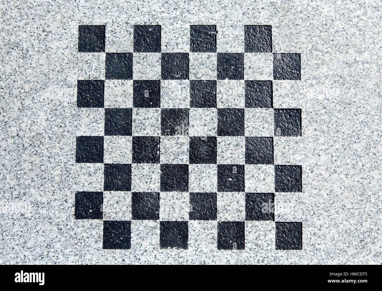 Grey speckled granite stone checkerboard for the games of chess and ...