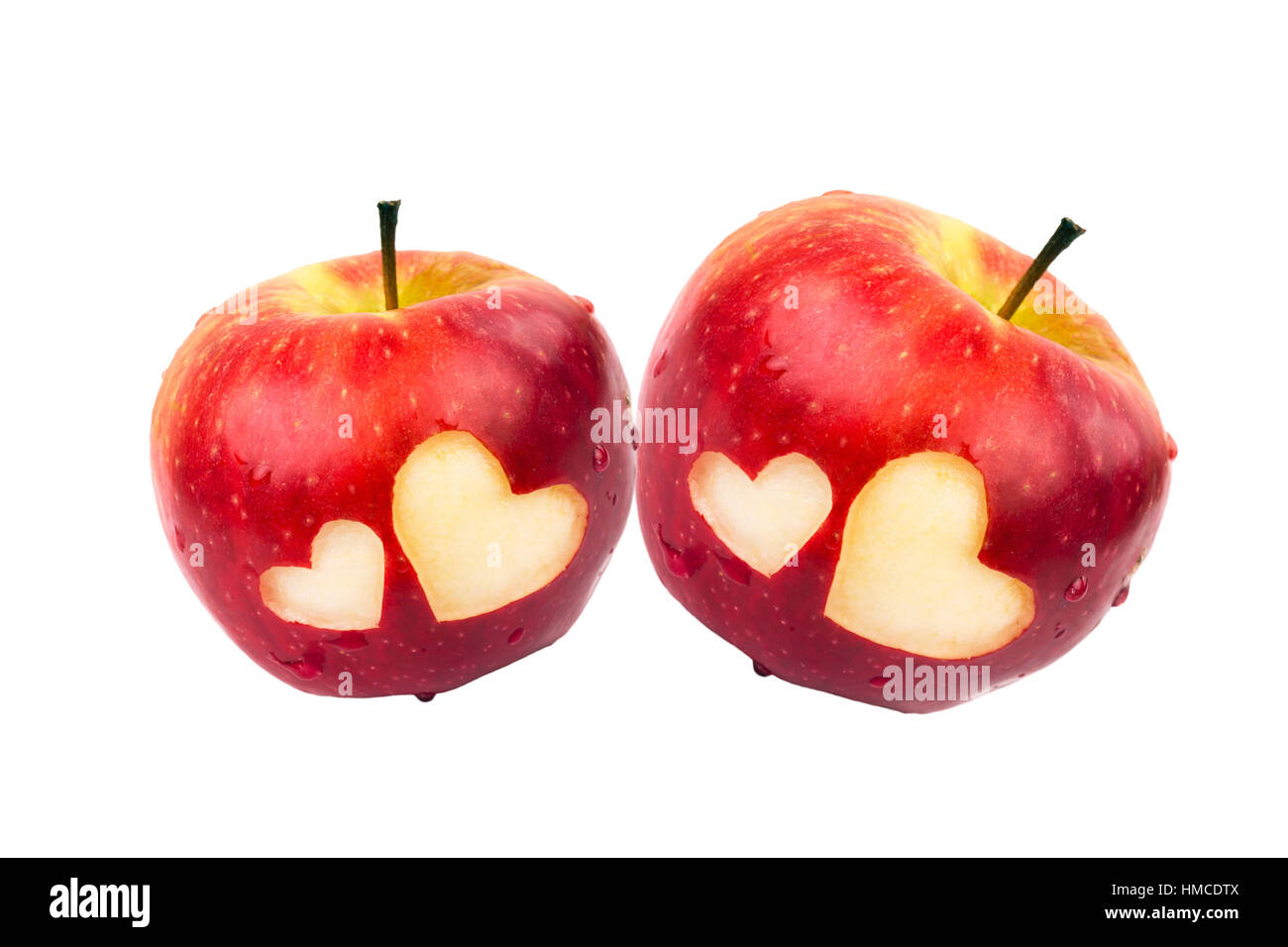 Happy Valentine's Day, two apples with hearts on a white background ...