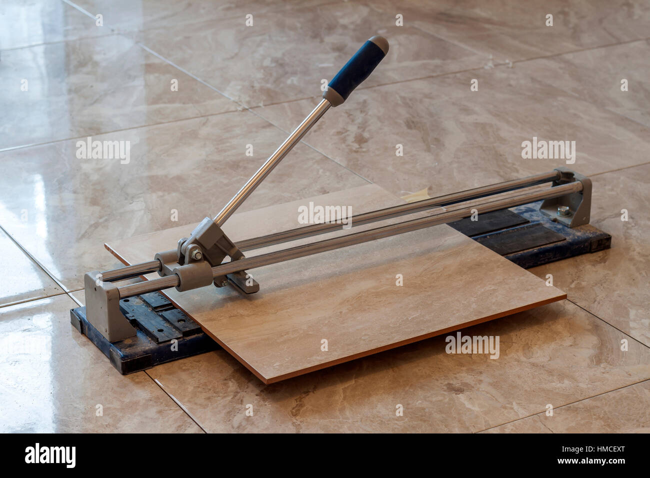 Ceramic tiles and tools for tiler. Floor tiles installation. Home ...