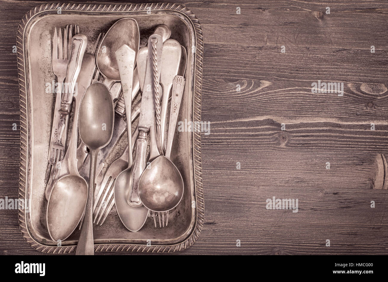 Vintage silverware on table above Stock Photo - Alamy