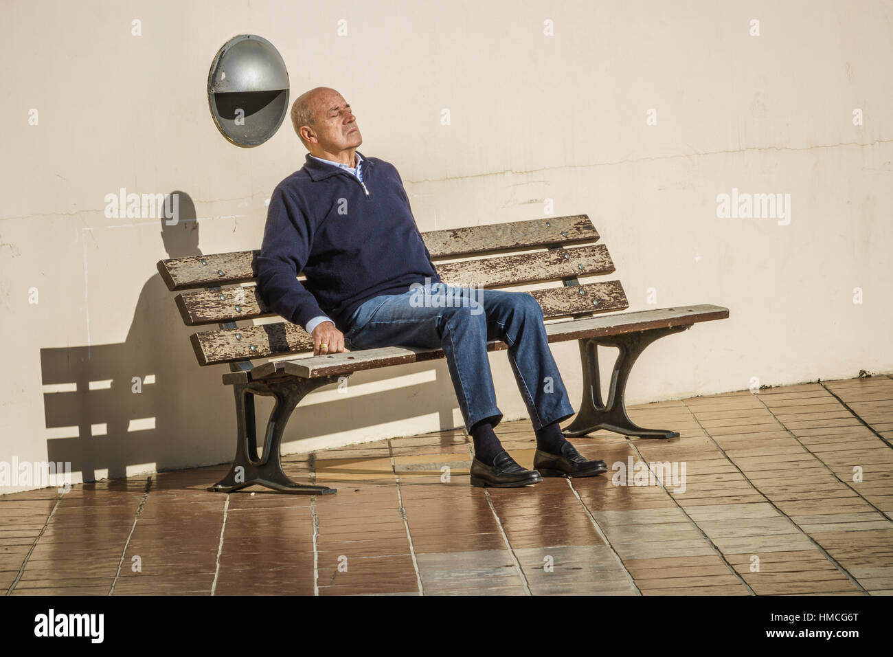Old man sunbathing hi-res stock photography and images - Alamy