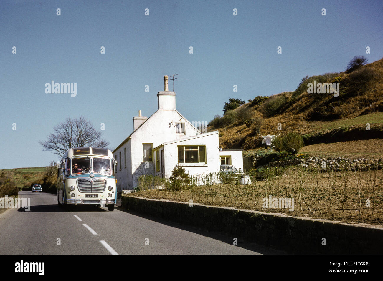 Jersey, Channel Islands - 1973: Vintage image of bus in St Helier ...