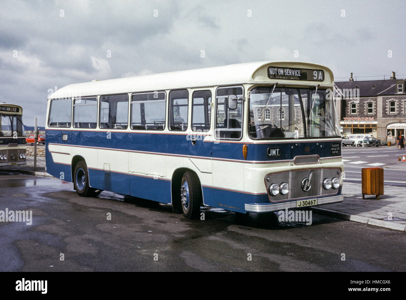Jersey, Channel Islands - 1973: Vintage image of bus in St Helier ...