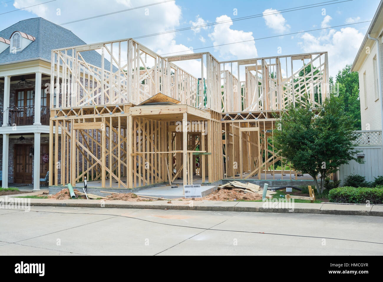 The addition of a residential structure between two existing residences ...