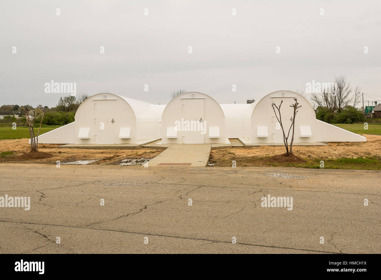 An industrial sized storm shelter at a factory. These three units are ...
