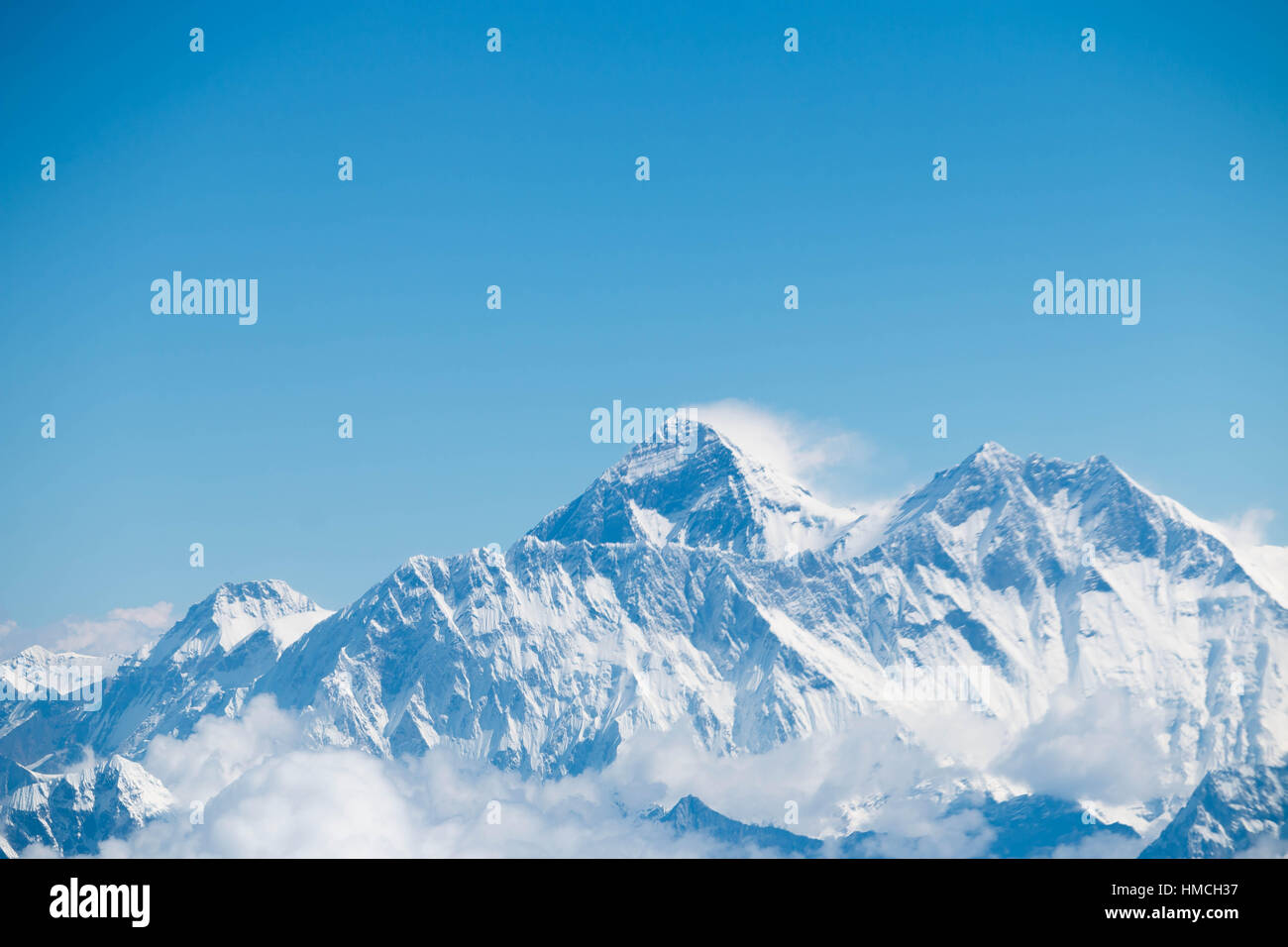 Mount Everest Himalaya mountain range Aerial view with clouds and now ...