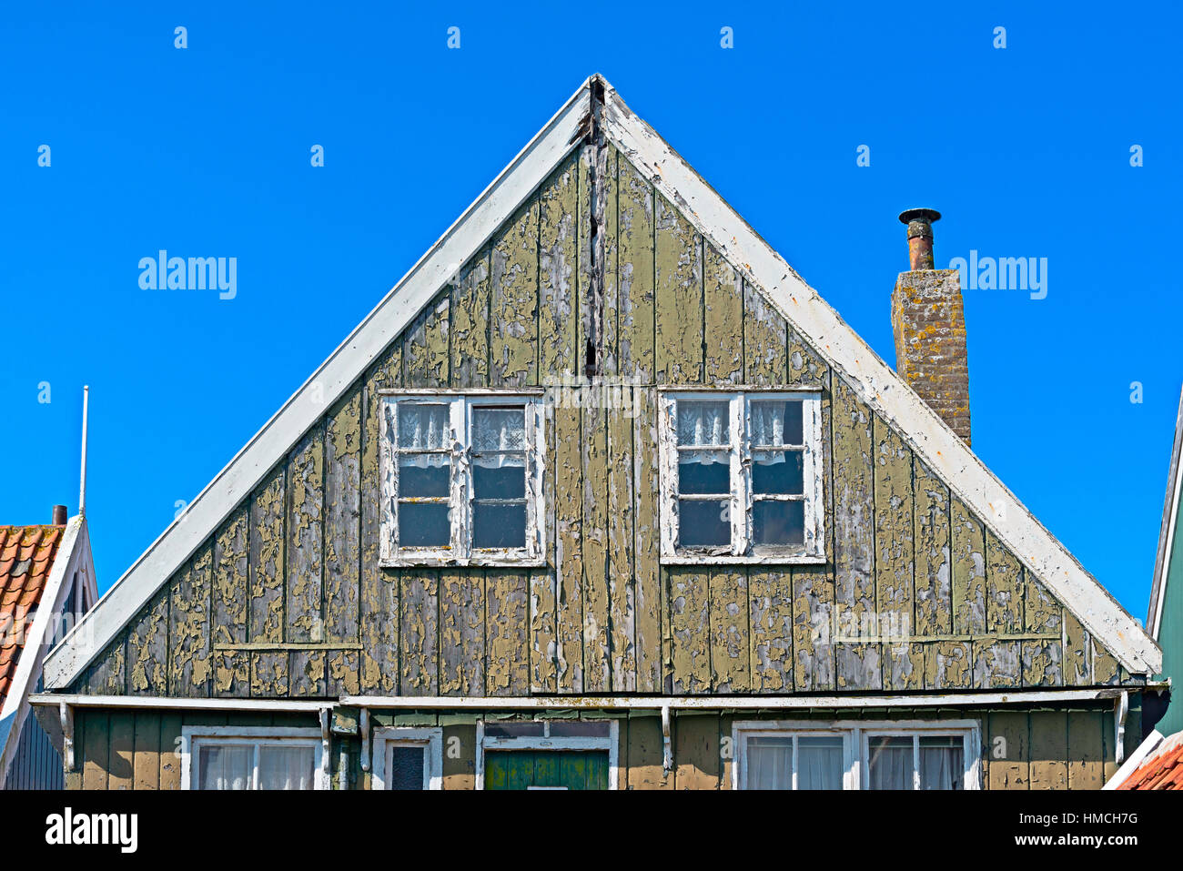 Detail of a house worn out facade in Marken Stock Photo - Alamy