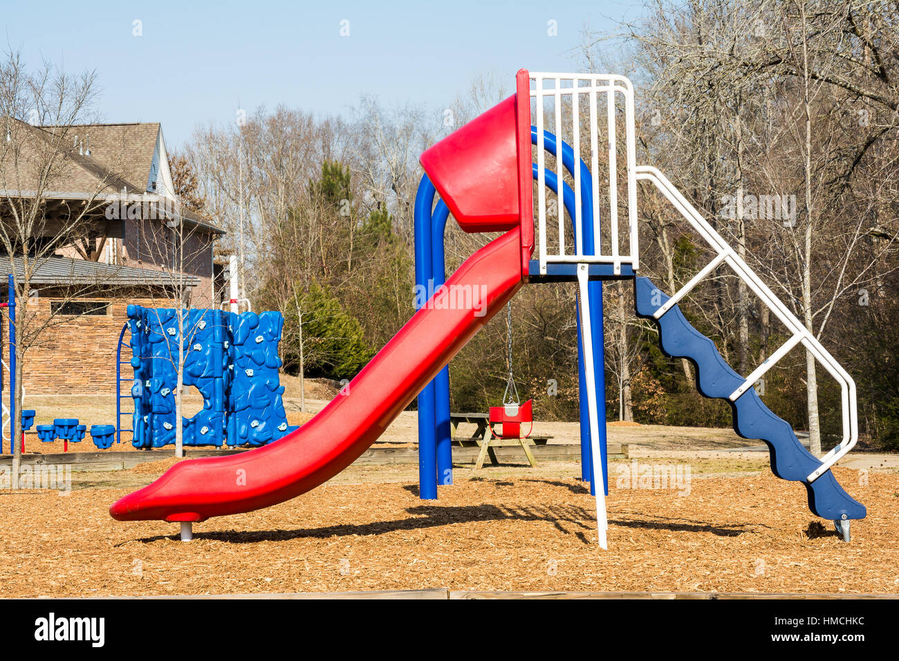 A playground slide in the park Stock Photo - Alamy