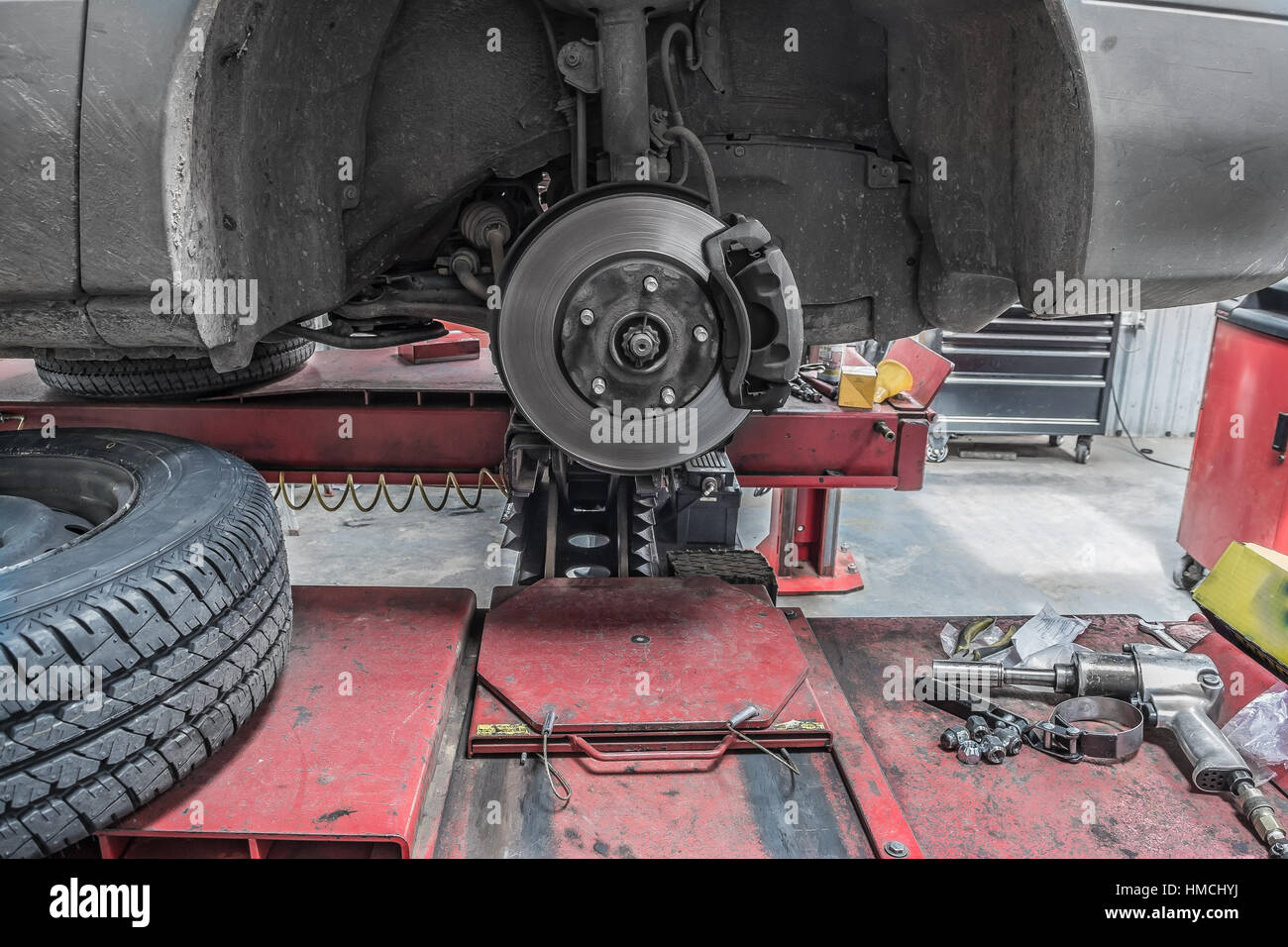 A detailed capture of a brake unit on the front wheel of a passenger ...