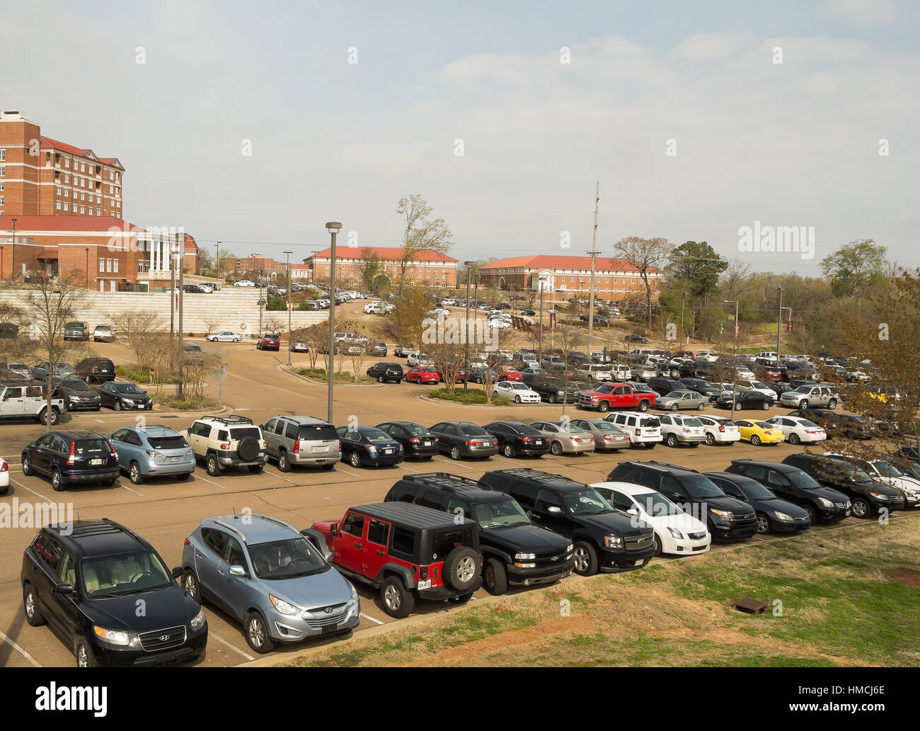 An image of an employee parking lot. Their workplaces are the ...