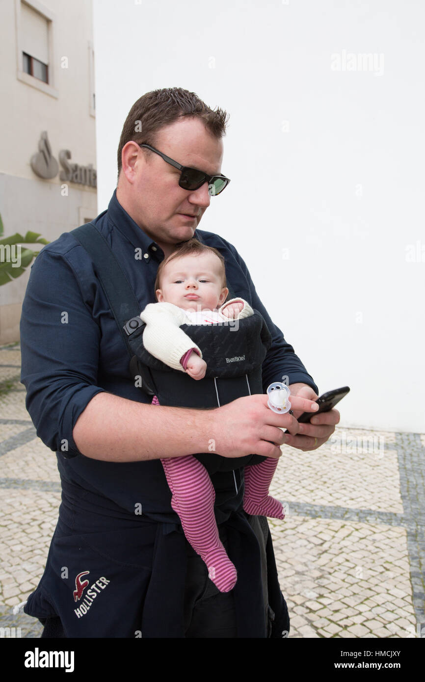 Dad on phone Stock Photo - Alamy