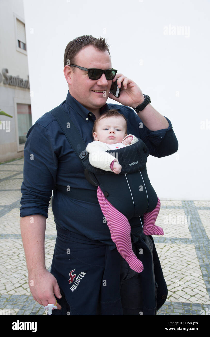 Newborn baby happy father phone hi-res stock photography and images - Alamy