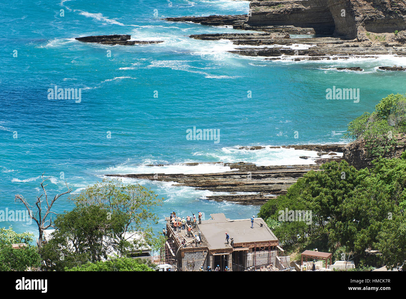 workers on building house with ocean view Stock Photo - Alamy