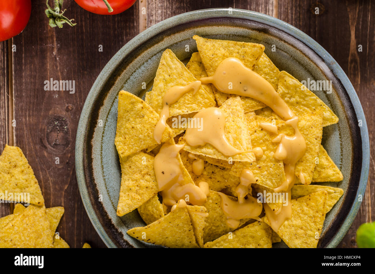 Nachos with homemade cheese dip, fast and delicious dip! Stock Photo ...