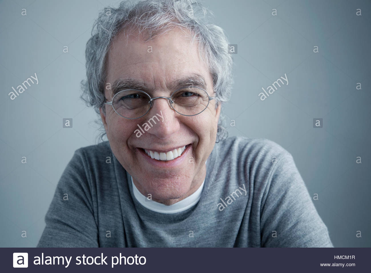 Portrait Happy Caucasian Senior Man With Gray Hair And Eyeglasses Stock