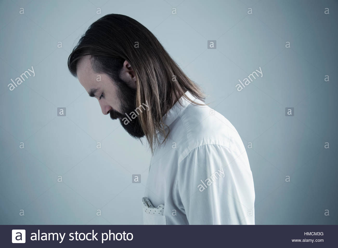 Man profile looking down hi-res stock photography and images - Alamy