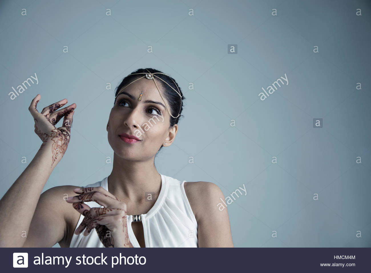 Indian woman with henna hi-res stock photography and images - Alamy
