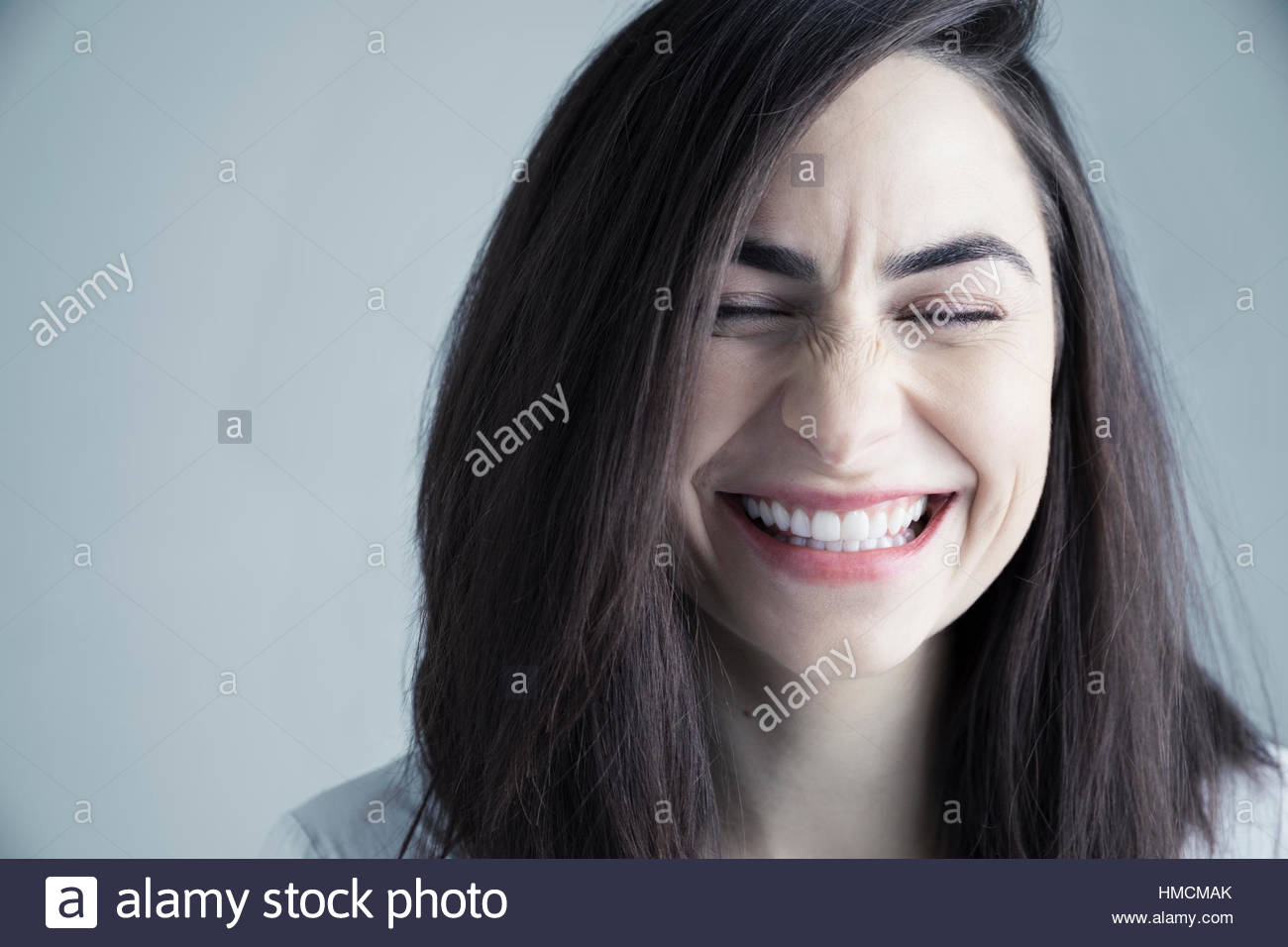 Close up portrait laughing brunette hi-res stock photography and images ...