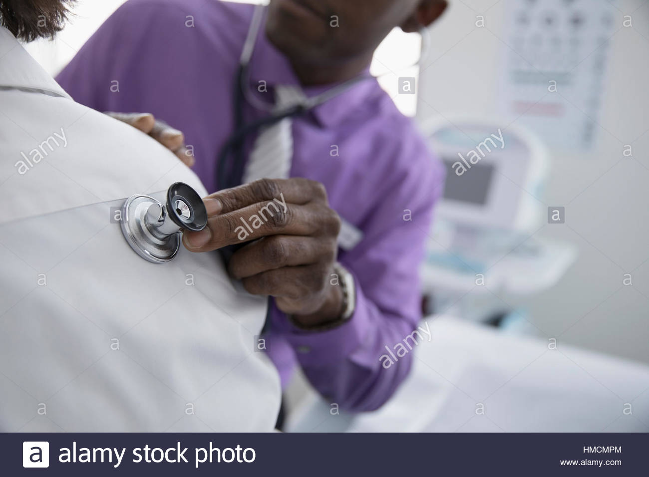 Doctor using a stethoscope hi-res stock photography and images - Alamy
