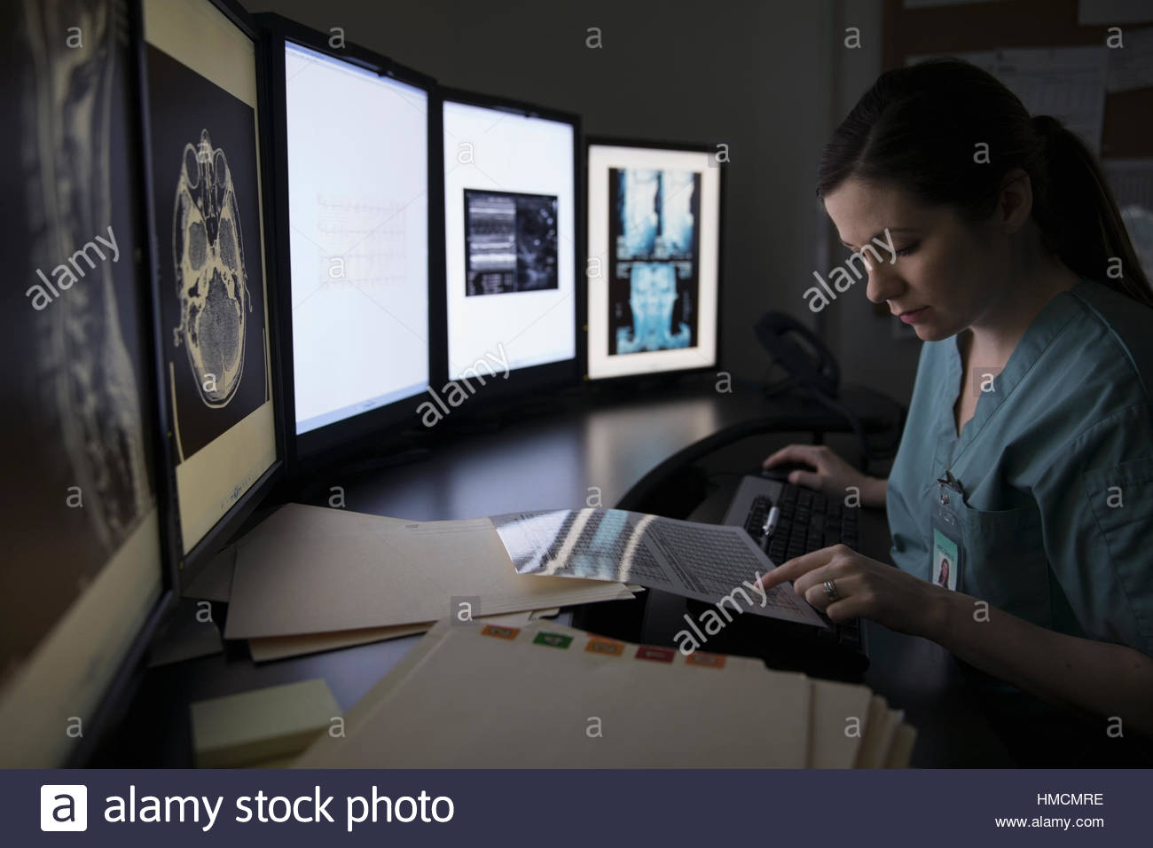 Doctor nurse looking computer monitor hi-res stock photography and ...
