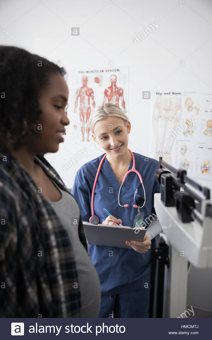 Nurse weighing patient hi-res stock photography and images - Alamy