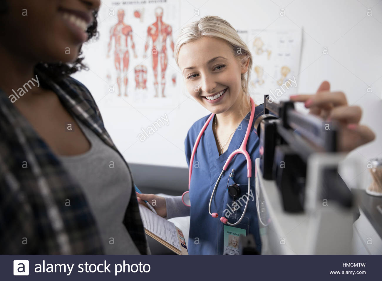 Woman holding weight scale hi-res stock photography and images - Alamy