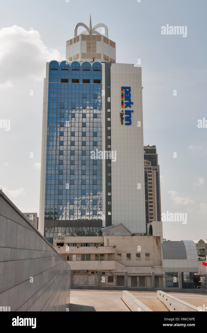 KIEV, UKRAINE - AUGUST 07: Workers are working on the roof of Hotel ...