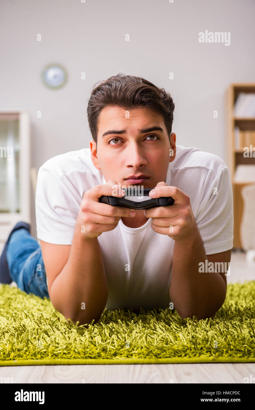 Man addicted to computer games Stock Photo - Alamy